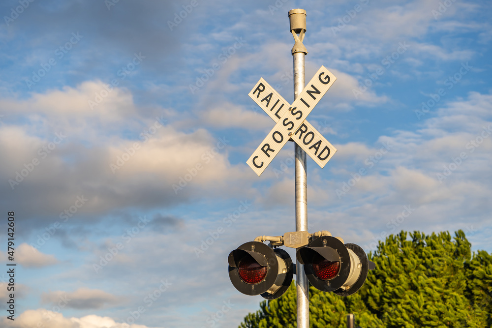 Classic american railroad crossing signal. Stock Photo | Adobe Stock