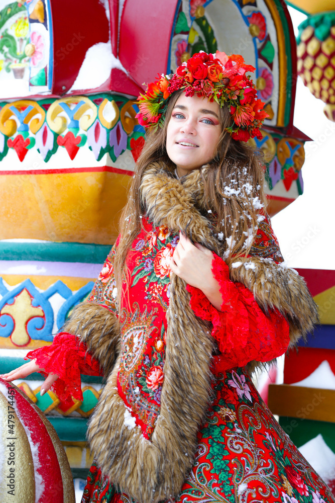 Beautiful long-haired blonde young girl in Russian traditional national ...