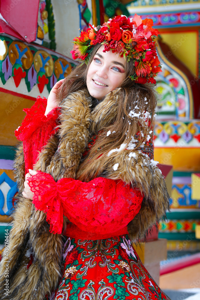 Beautiful long-haired blonde young girl in Russian traditional national ...