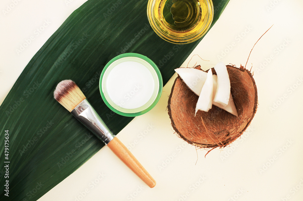 Coconut oil skincare beauty treatment cosmetic products top view with ...