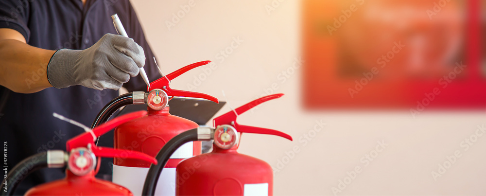 Engineer inspection checking pressure gauge level fire extinguisher of ...