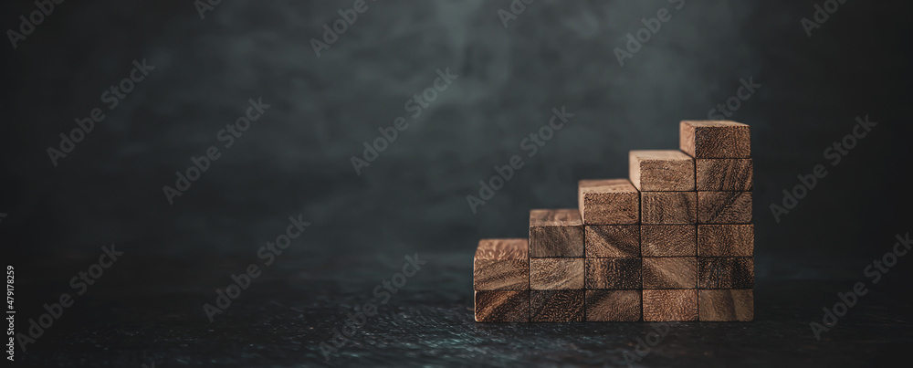 Wood block tower stack in stair step concept of prevent collapse or ...