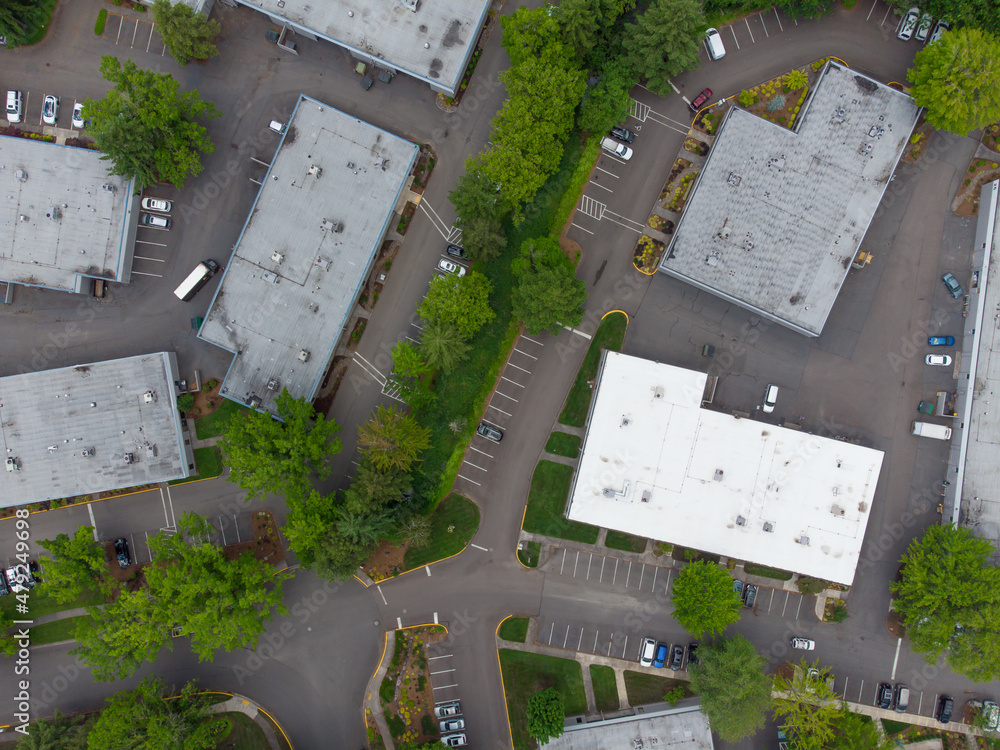 Aerial view. Small suburb. Industrial Zone. Roofs of large one-story ...
