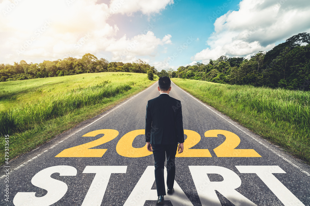 The 2022 New Year journey and future vision concept . Businessman ...