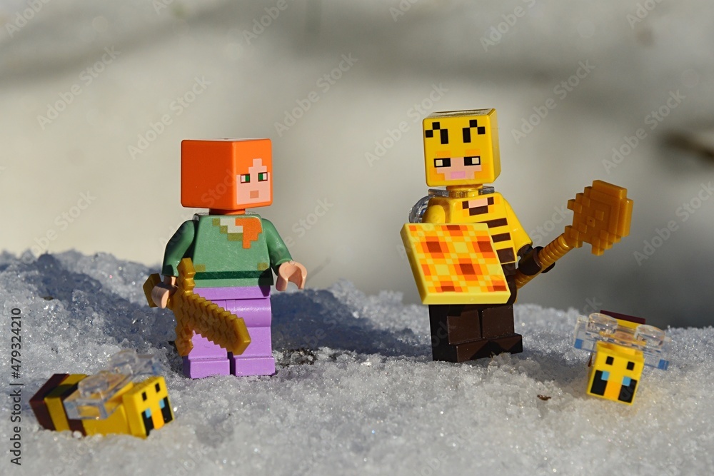 LEGO Minecraft figures of main character Alex with golden sword and ...