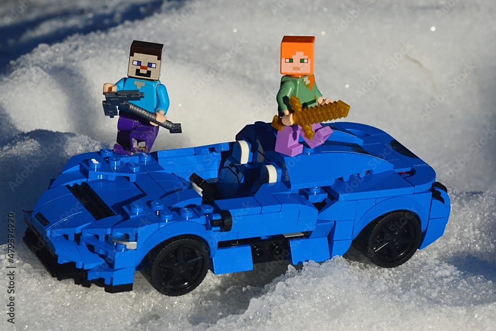 LEGO Minecraft figures of Steve with iron pickaxe and Alex with golden ...