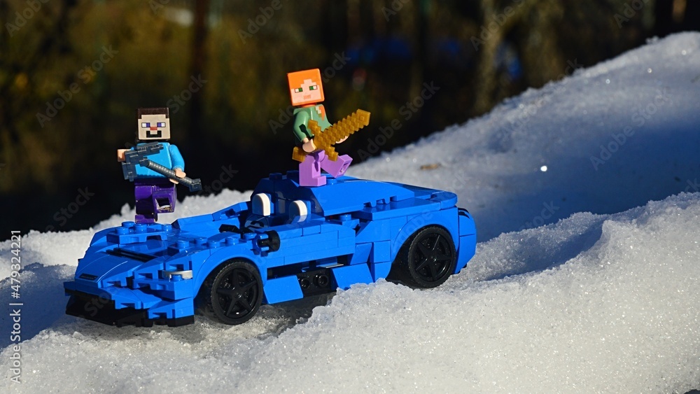 LEGO Minecraft figures of Alex with golden sword and Steve with iron ...