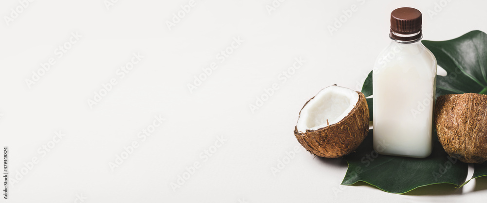 Coconut Oil or Cream, tropical leaves and coconut. Banner with Natural ...