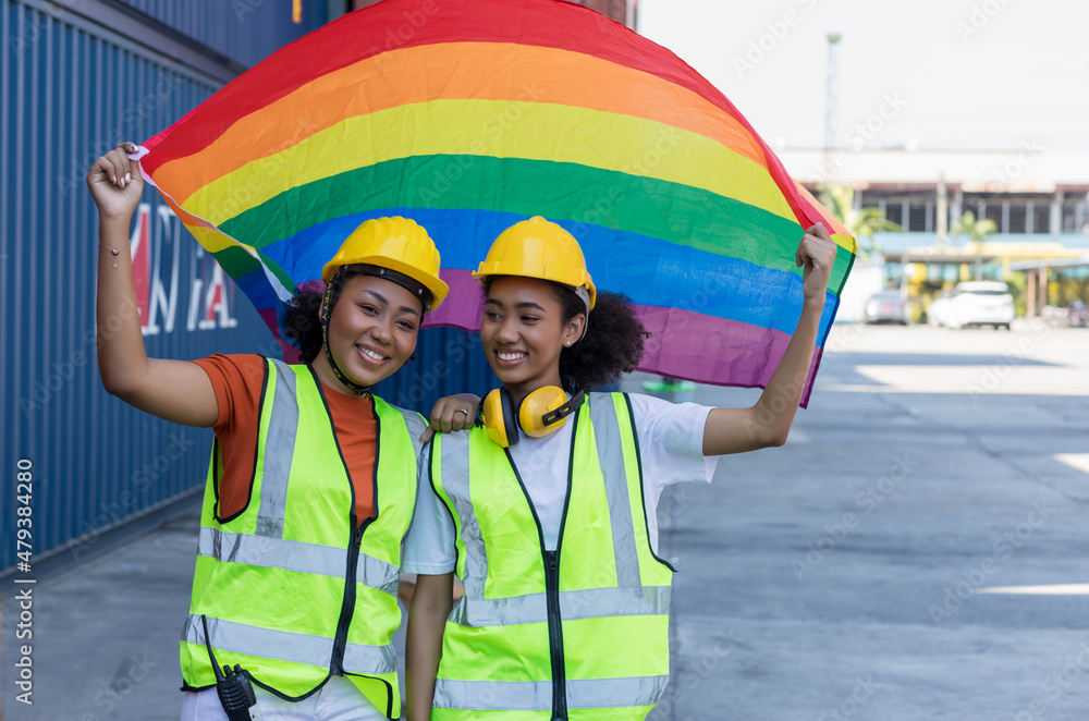African American women with LGBTQ flag for transgender and sexual ...
