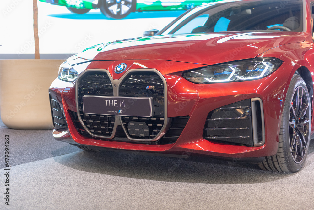 Red 2022 BMW i4 M50 on display.. Stock Photo | Adobe Stock