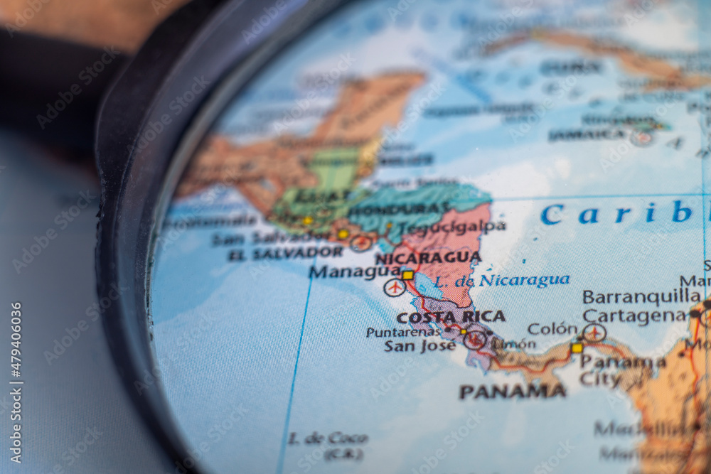 Costa Rica on a world map through magnifying glass. Costa Rica travel ...