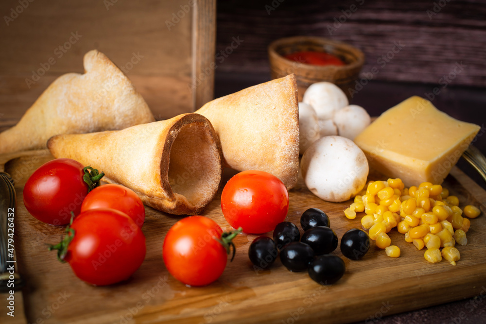 pizza cone ingredients, delicious pizza horns with a crispy thin crust ...