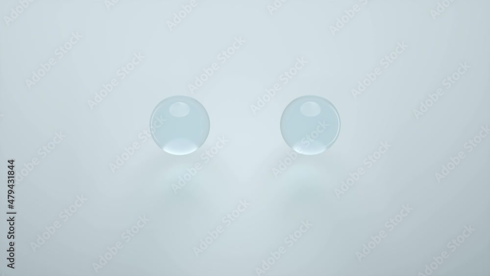 Abstract water drop splitting in two and rejoining. Minimalistic motion ...