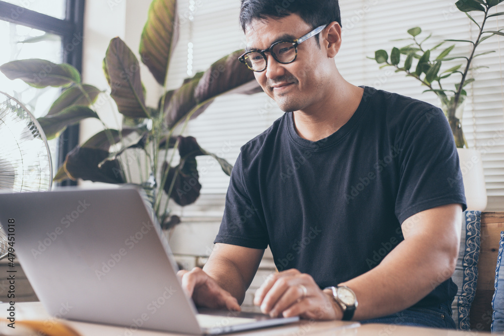 asian man work using computer hand typing laptop keyboard contact us ...