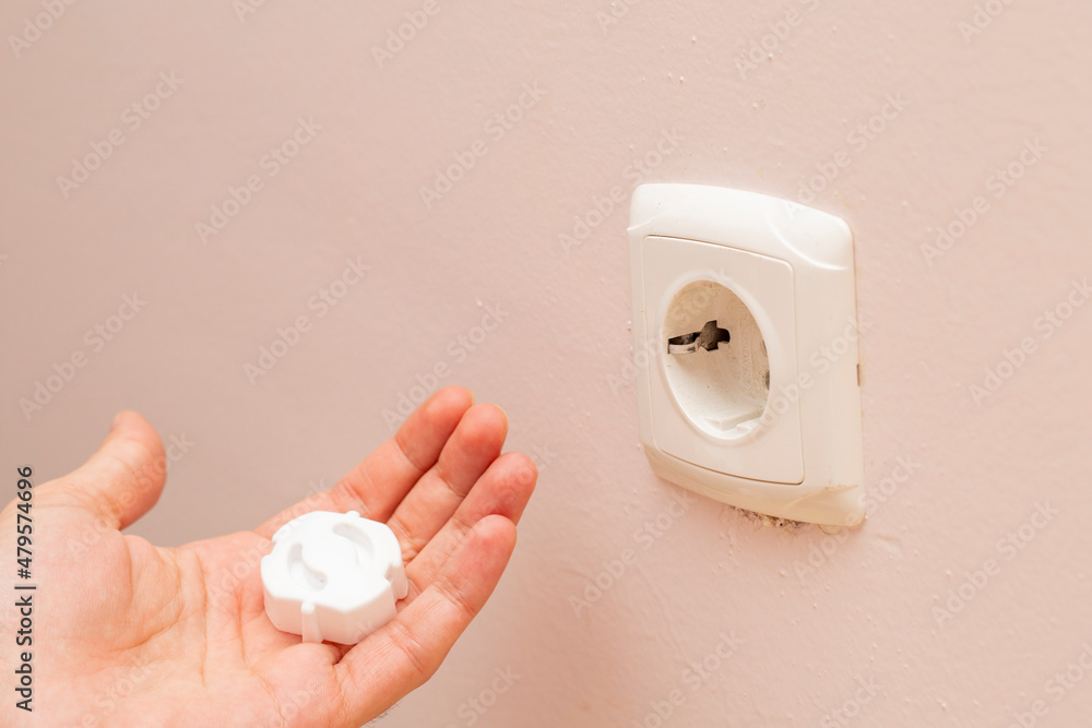 Plug, mechanical protection of the electrical outlet from electric ...