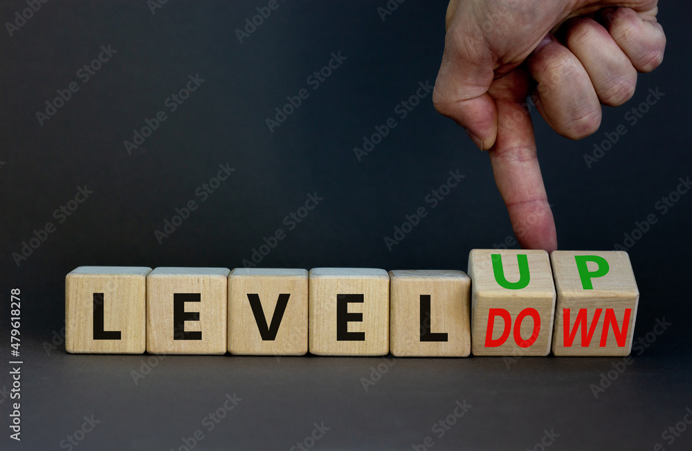 Level up or down symbol. Businessman turns cubes and changes concept ...