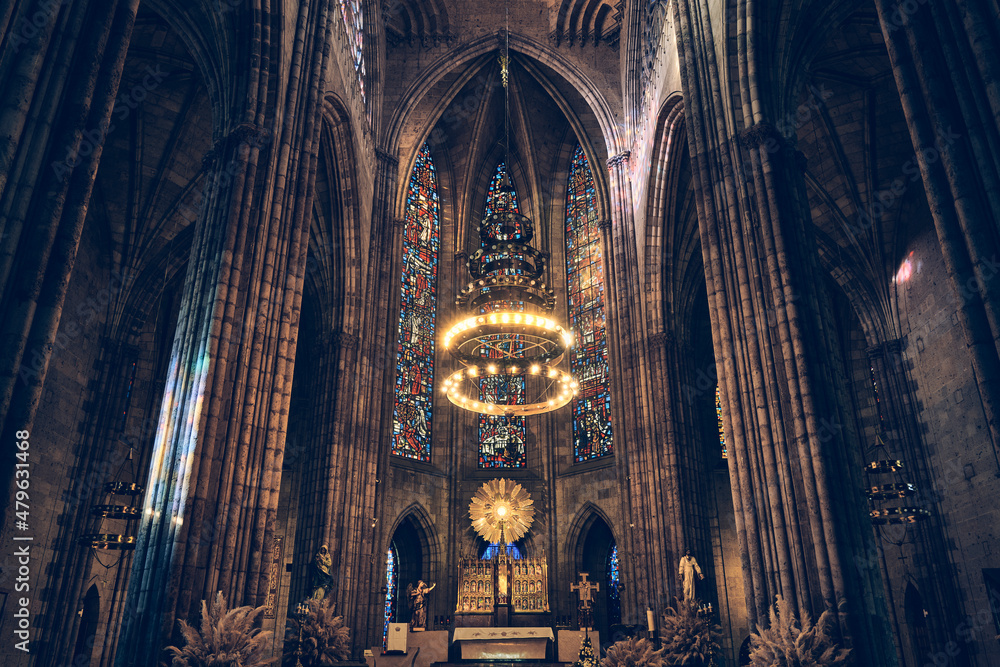 interior of huge gothic cathedral. altarpiece with golden details Stock ...
