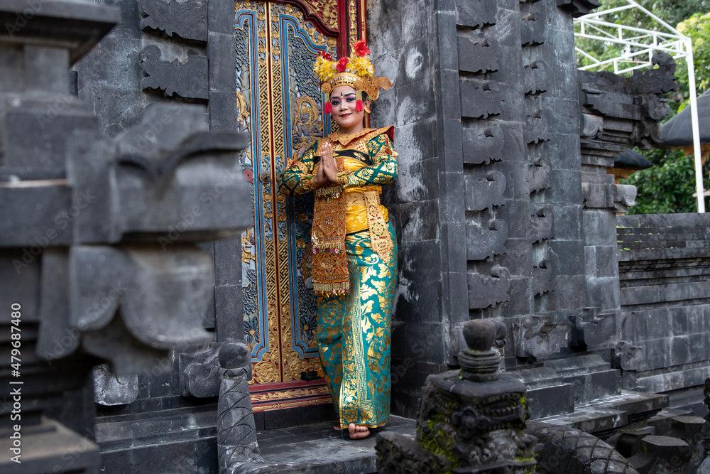 Balinese dancer woman in gold costume, Temple Bali Indonesia Stock ...