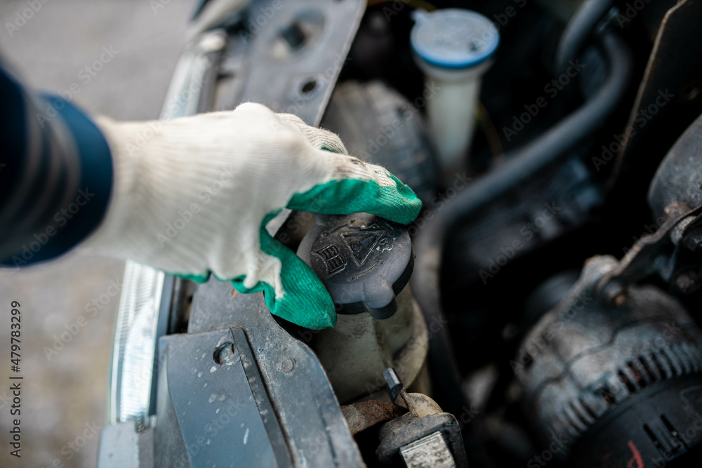 checking the level of antifreeze in the coolant in the car, high ...