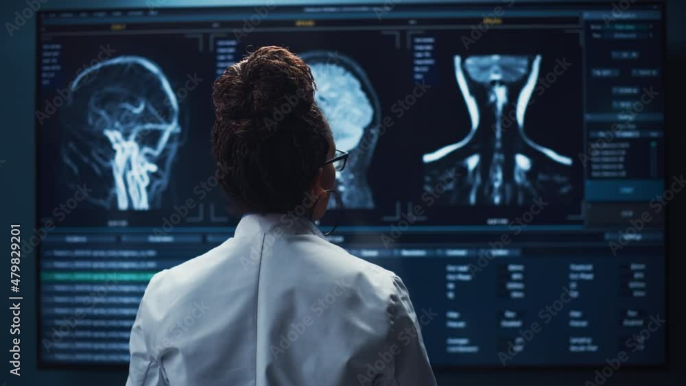 Medical Hospital Research Lab: Black Female Neuroscientist Looking at ...