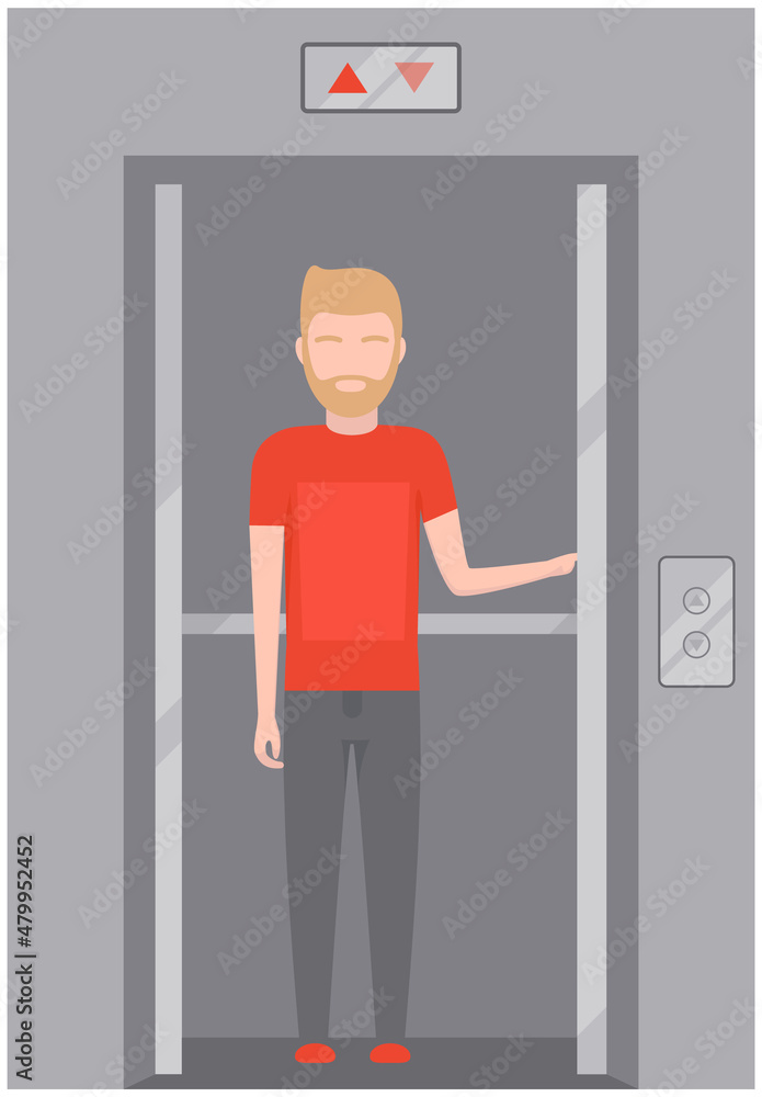 Man stands in modern elevator with iron doors. Lifting mechanism of new ...
