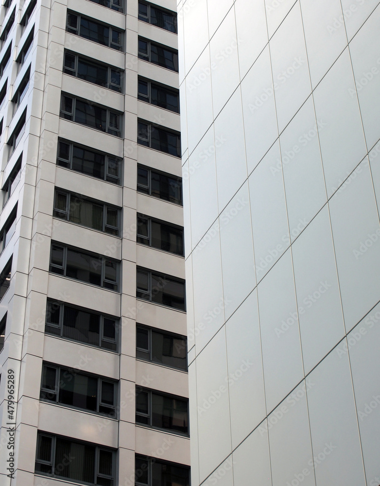 close up perspective detail of tall high rise modern apartment ...
