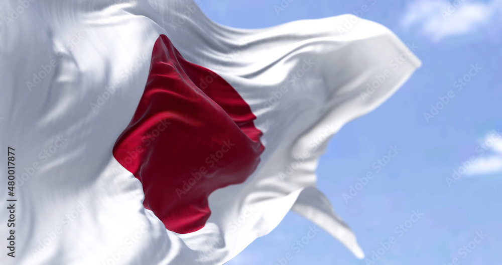 Detailed close up of the national flag of Japan waving in the wind on a ...