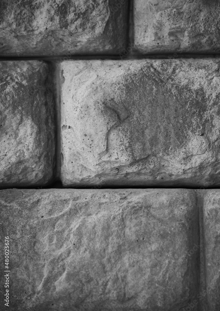 rectangular shaped rocks or offset concrete blocks stacked retaining ...