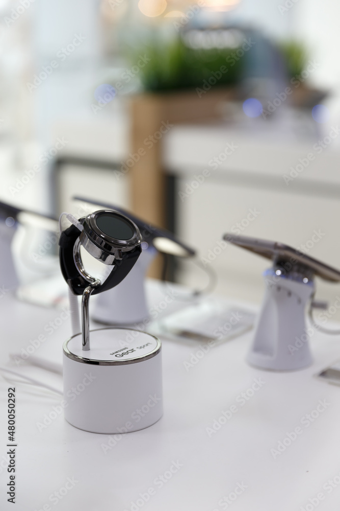 Samsung Gear Sport SM-R600 smartwatch displayed on original stand on ...