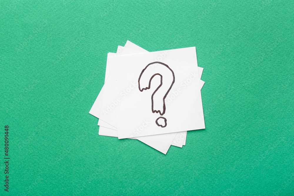 White sticky notes with question mark on green background Stock Photo ...