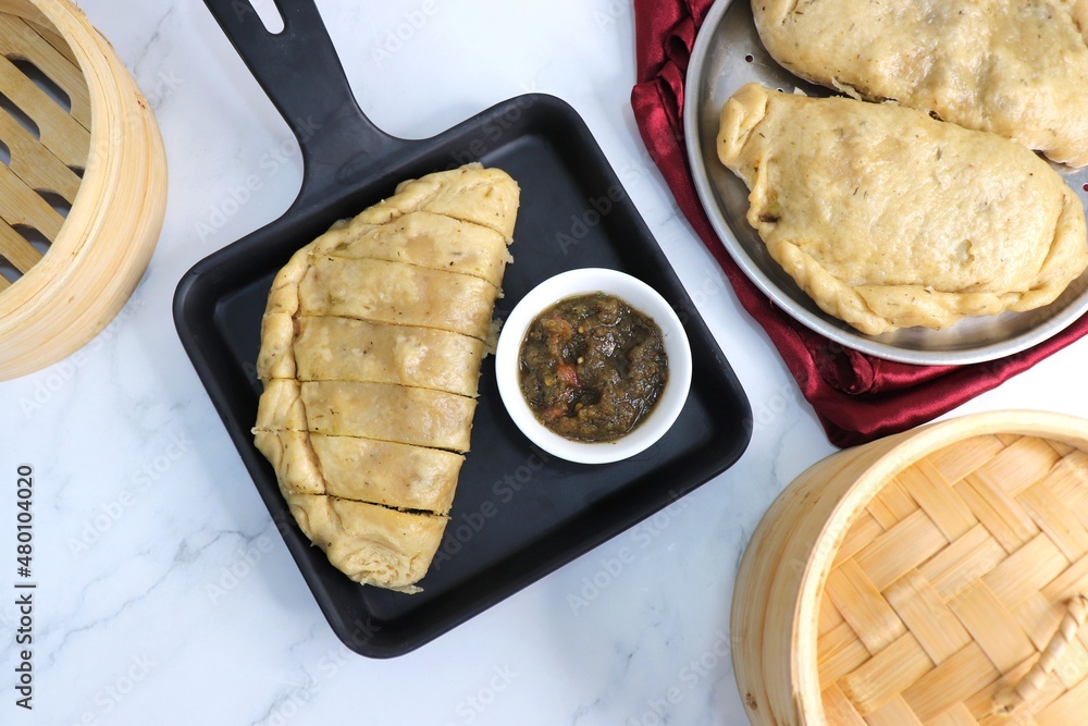 Himachali Local dish siddu. It's a steamed stuffed bread. Made from ...