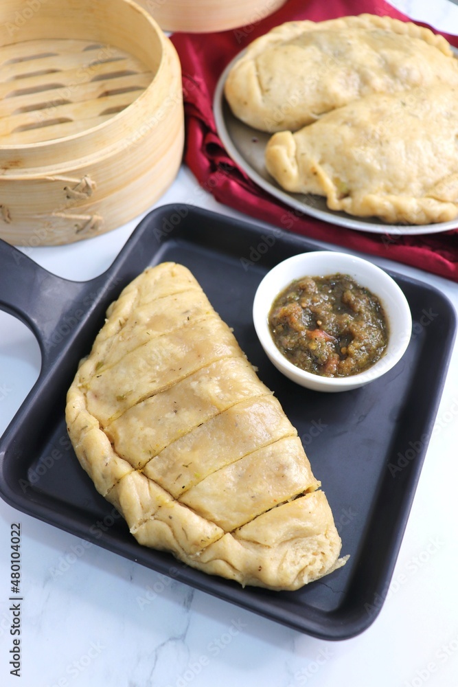 Himachali Local dish siddu. It's a steamed stuffed bread. Made from ...