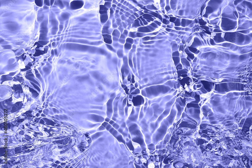 Very peri color of year 2022. Purple water surface with waves, splashes ...