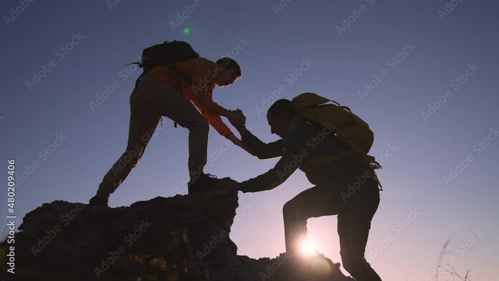 Family team success.Silhouette of group people.Climb to the top of ...