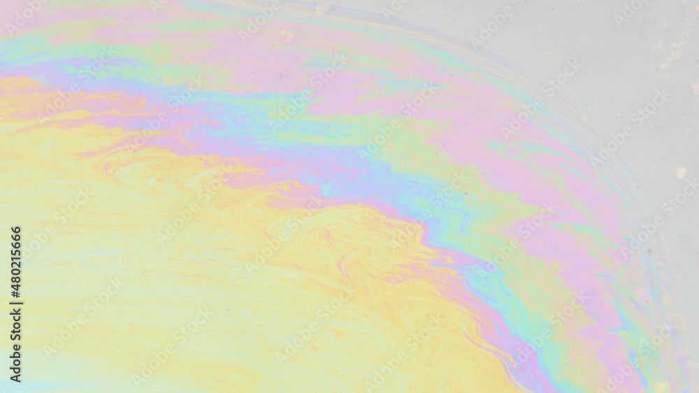 Rainbow. Old faulty cars emit gasoline and oil, petroleum products ...