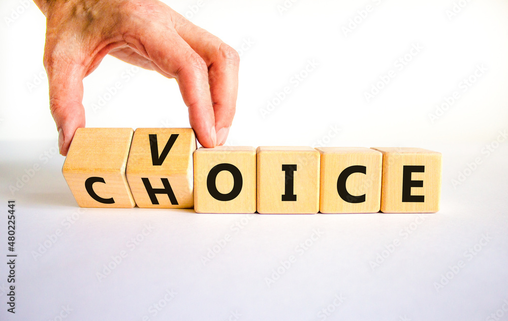 Voice and choice symbol. Businessman turns wooden cubes and changes the ...