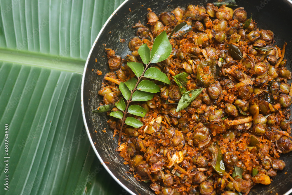 Clam meat fry kerala style kakka irachi fry Stock Photo | Adobe Stock