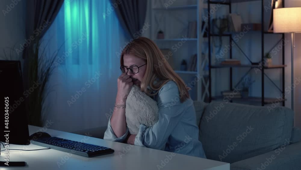 Scary movie. Shocked woman. Online translation. Frighten lady grasping ...