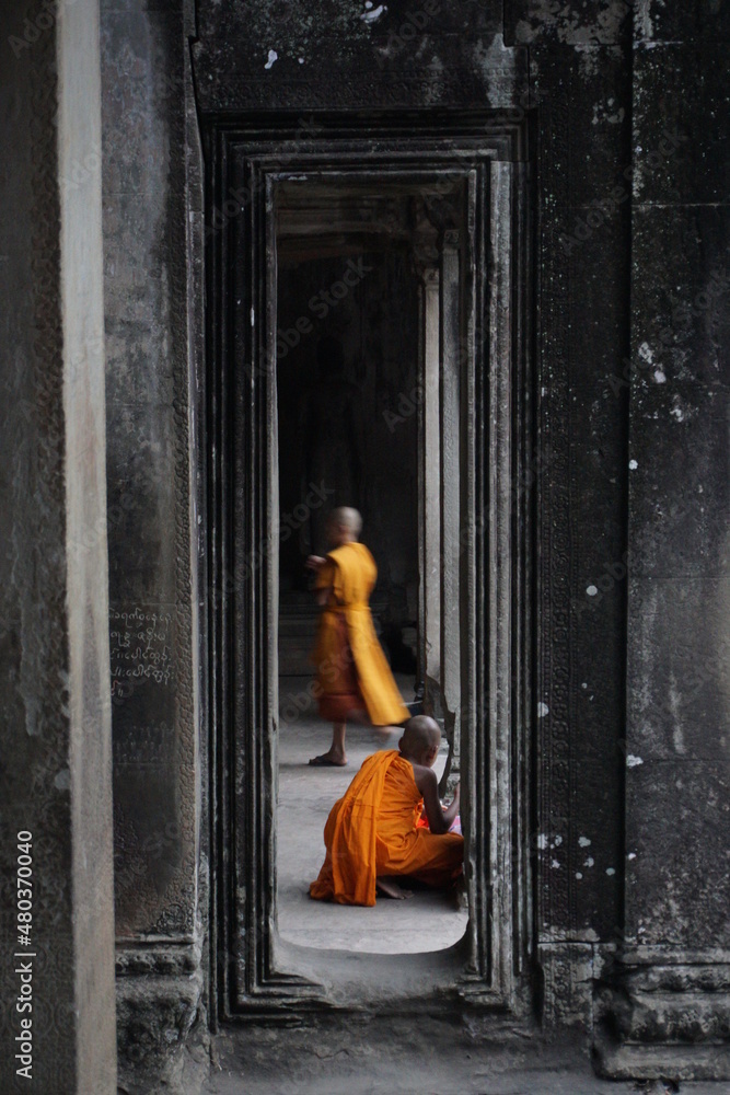 Buddhist monks in temple Stock Photo | Adobe Stock