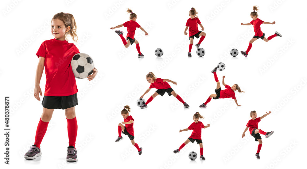 Full-length portrait of little girl, child, training, playing football ...