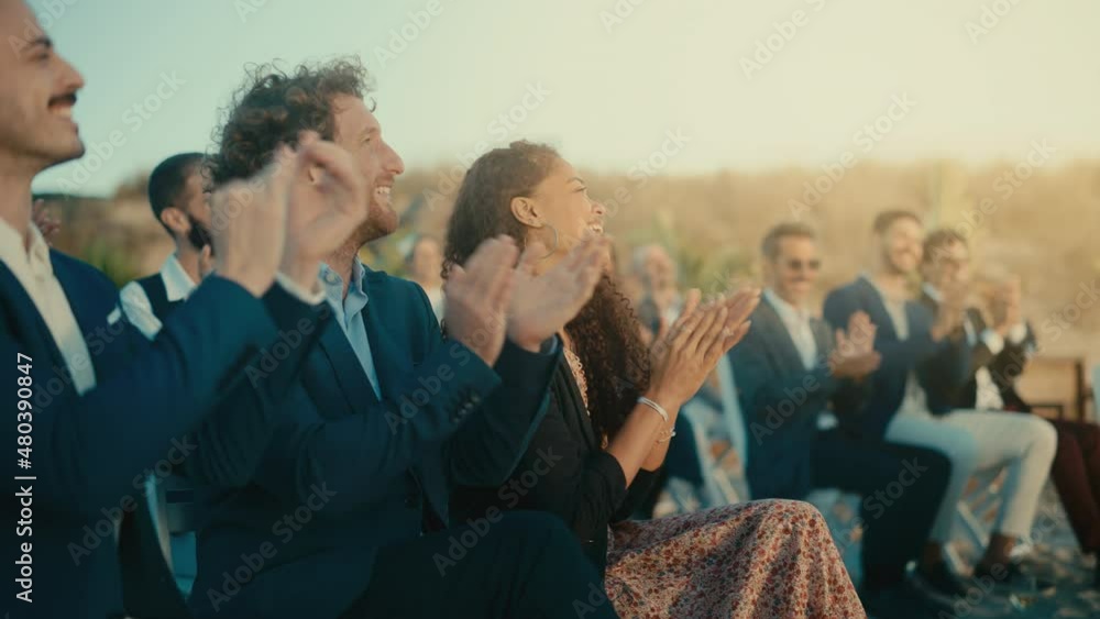 Excited Guests Sitting in an Outdoors Venue and Clapping Hands ...
