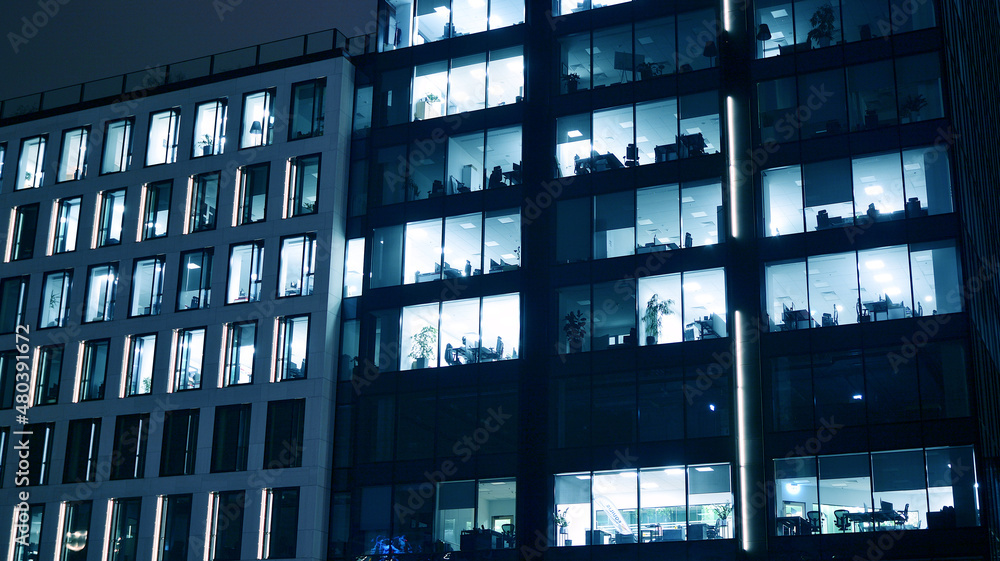 Amazing night cityscape. Office building at night, building facade with ...