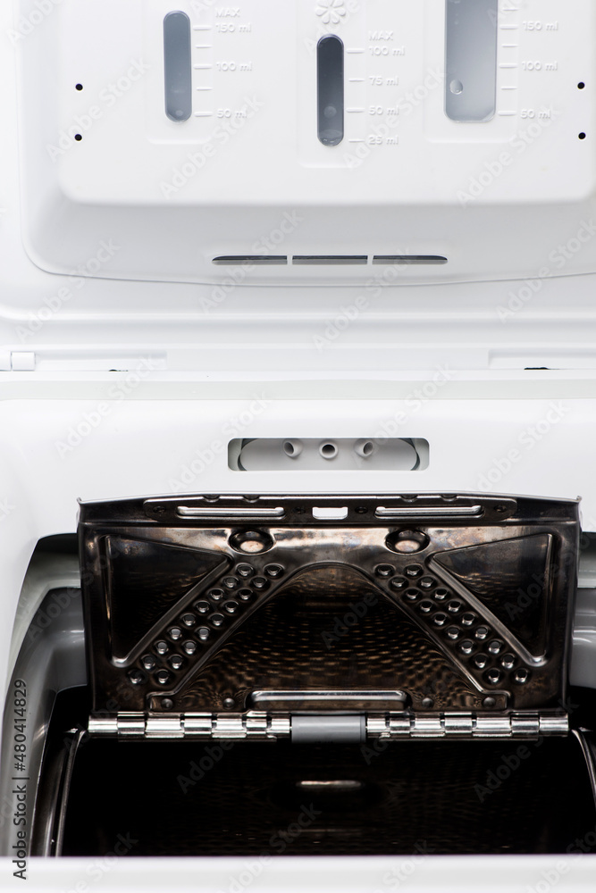 washing machine top loading tray. Stock Photo | Adobe Stock
