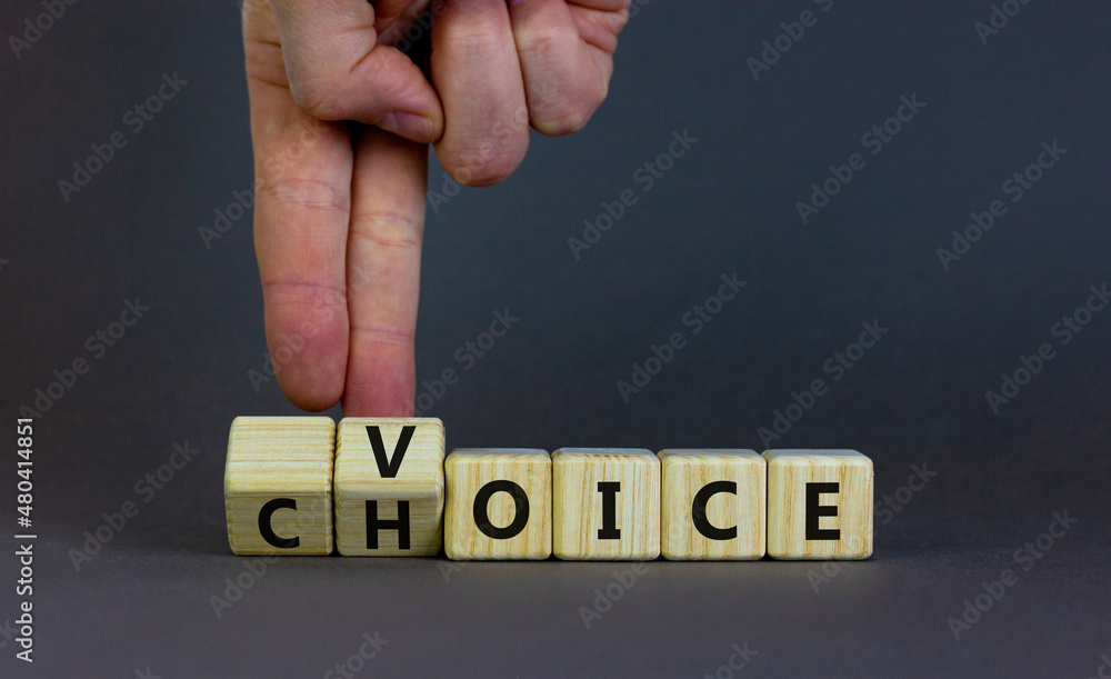Voice and choice symbol. Businessman turns wooden cubes and changes the ...