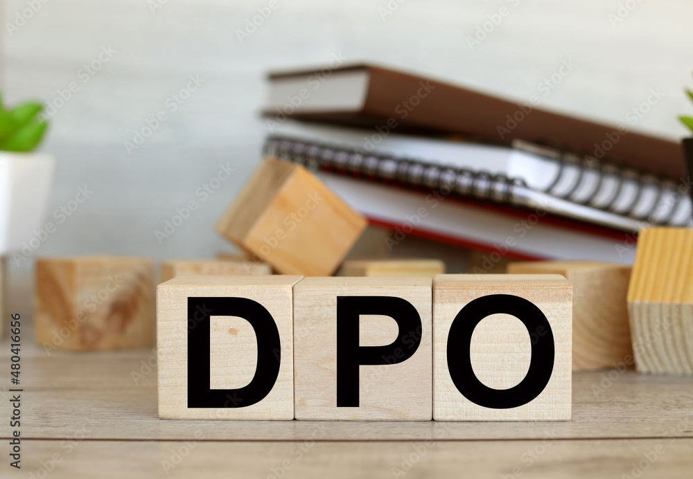 DPO - Days Payable Outstanding .text about wooden blocks. acronym with ...