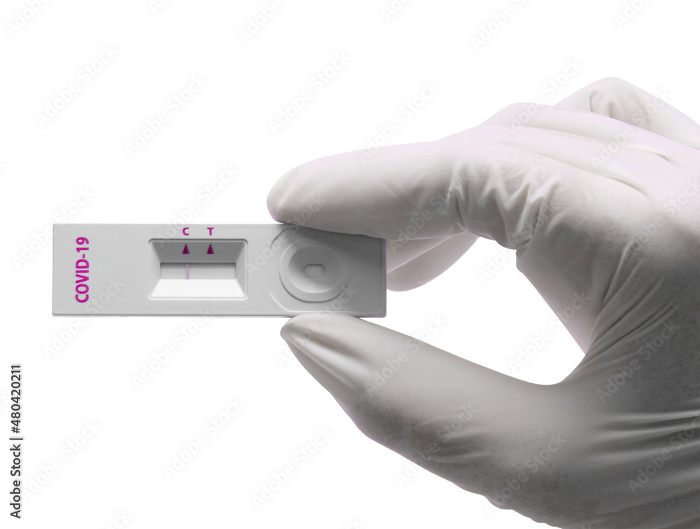 Doctor holding a COVID-19 test kit Test results are negative, not ...