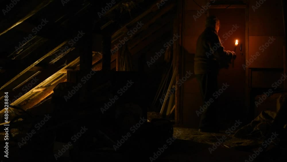 elderly old man gray-haired glasses sight holding lit candle fire in ...