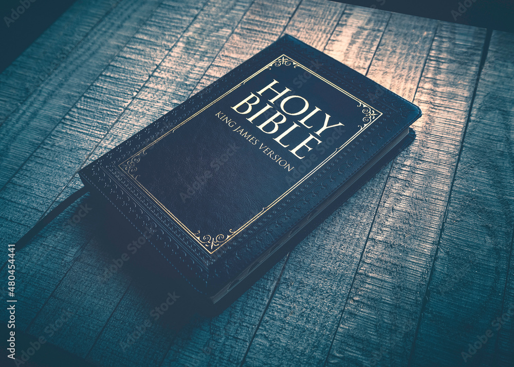 Holy Bible on a wooded table Stock Photo | Adobe Stock
