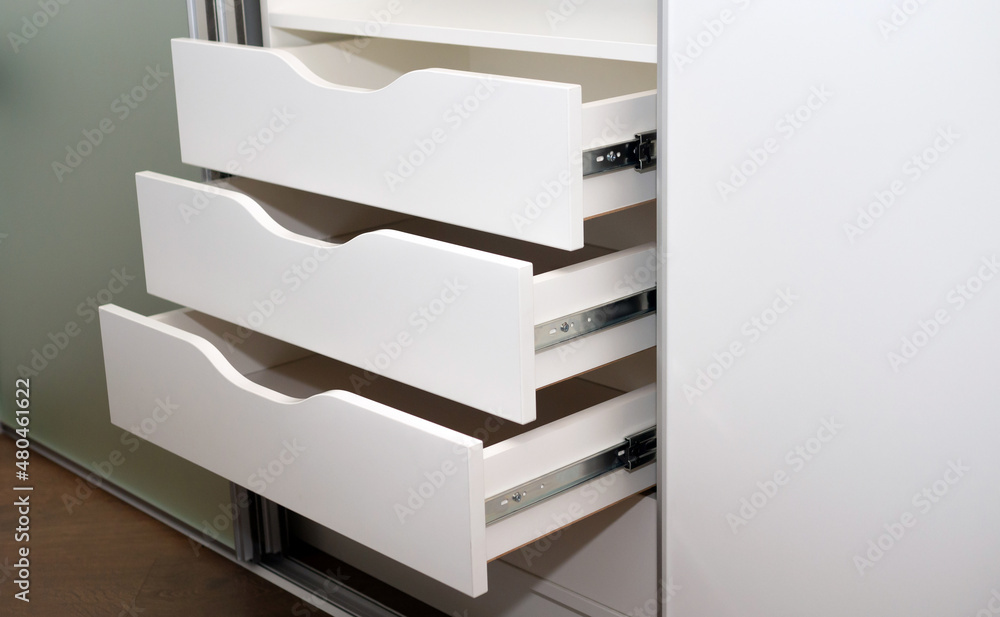 Modern open drawers for storage in a cabinet with mortise handles ...