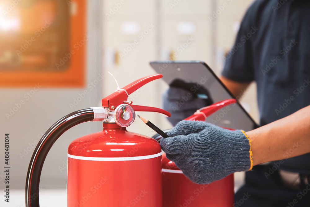 Fire extinguisher, Engineer inspection checking pressure gauge level ...